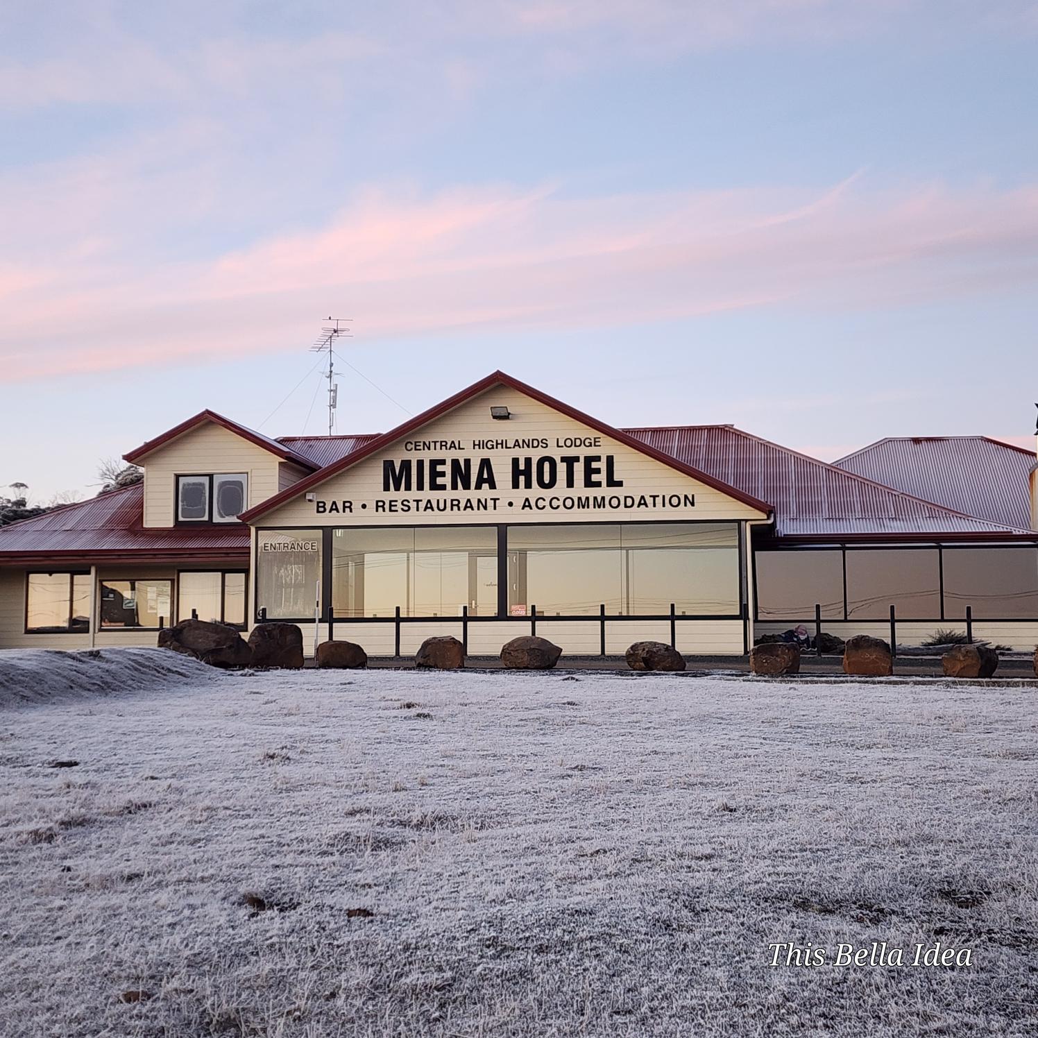 Snow settles in Tasmania as fires burn in state's east and north